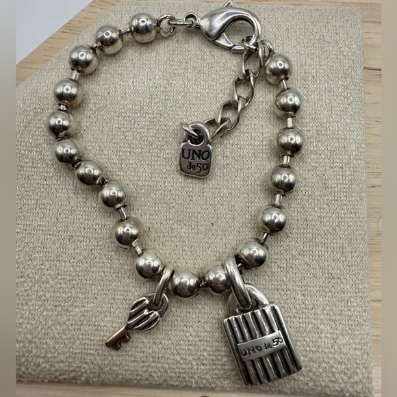 UNO de 50 | Jewelry | Used Uno De 5 Silver Beaded Charm Bracelet | Poshmark